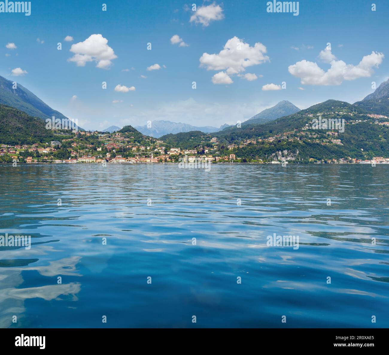 Lake Como (Italy) summer view and Menaggio town on shore Stock Photo ...
