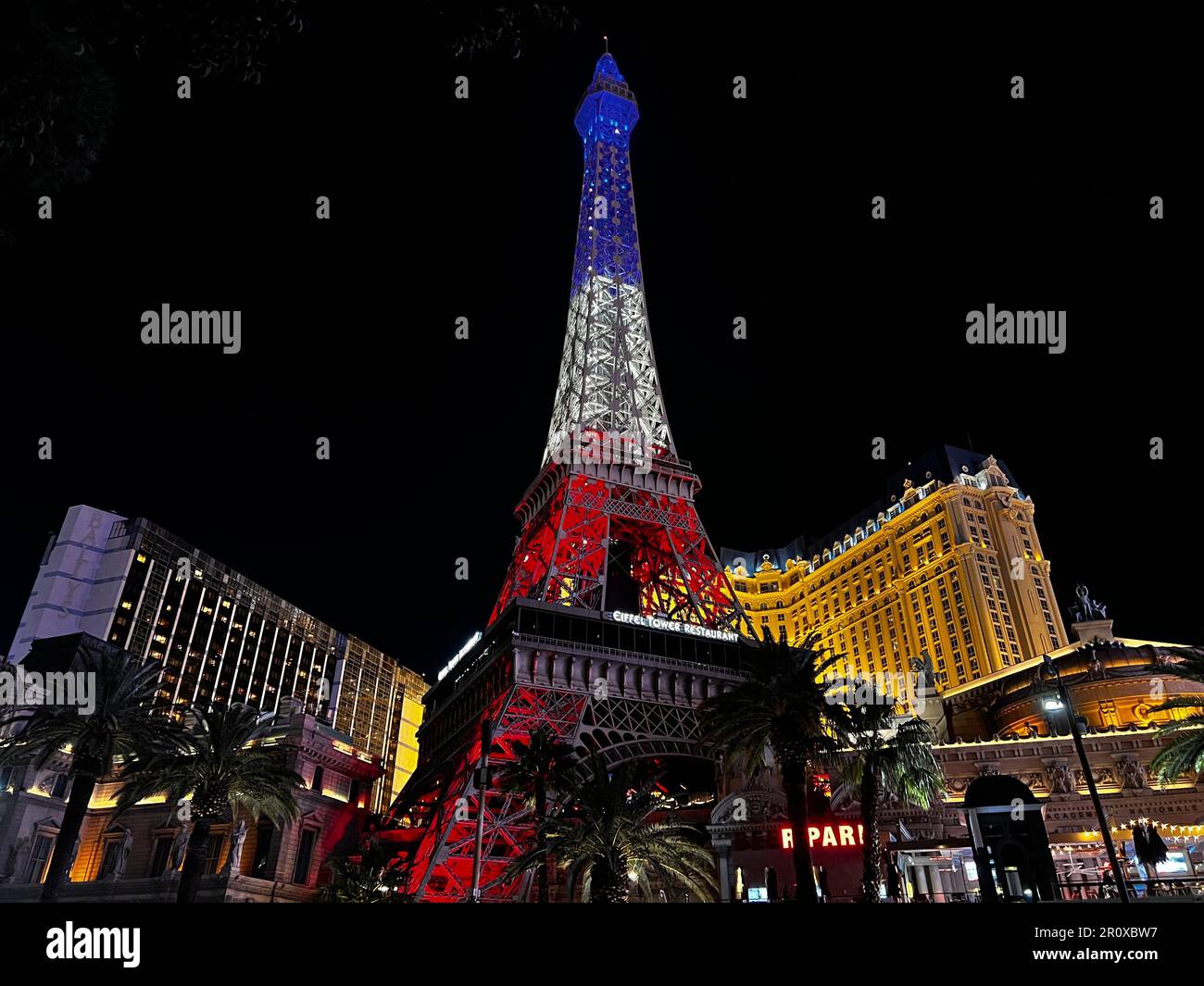 Eiffel tower illuminated colors hi-res stock photography and images - Alamy