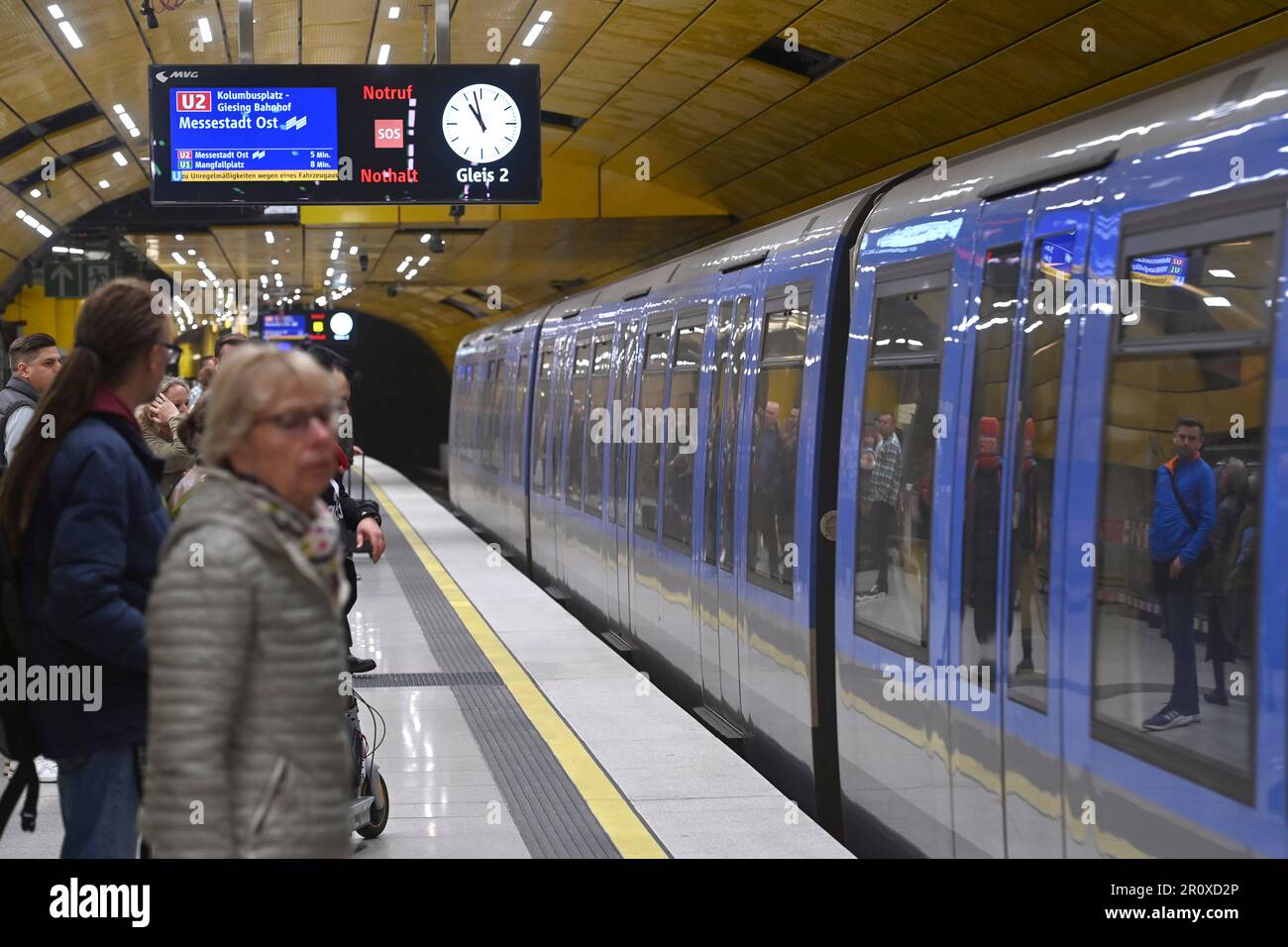 Incoming subway in Munich, train, train. Commuters, local public ...