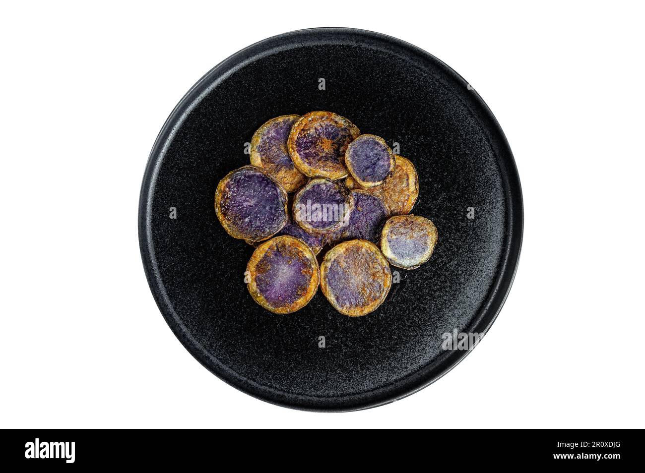 Fried purple potatoes with rosemary. Isolated on white background Stock ...