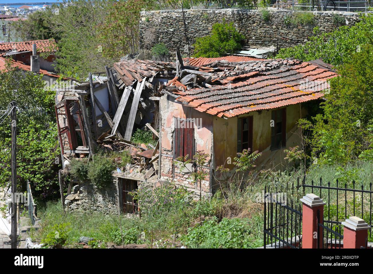 Abandoned traditional house with broken roof and walls in Ani Poli, the ...
