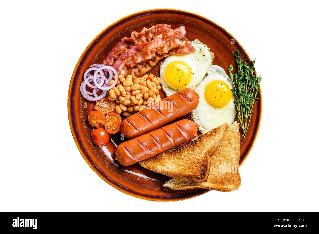 Traditional Full English breakfastt with fried eggs, sausages, bacon ...