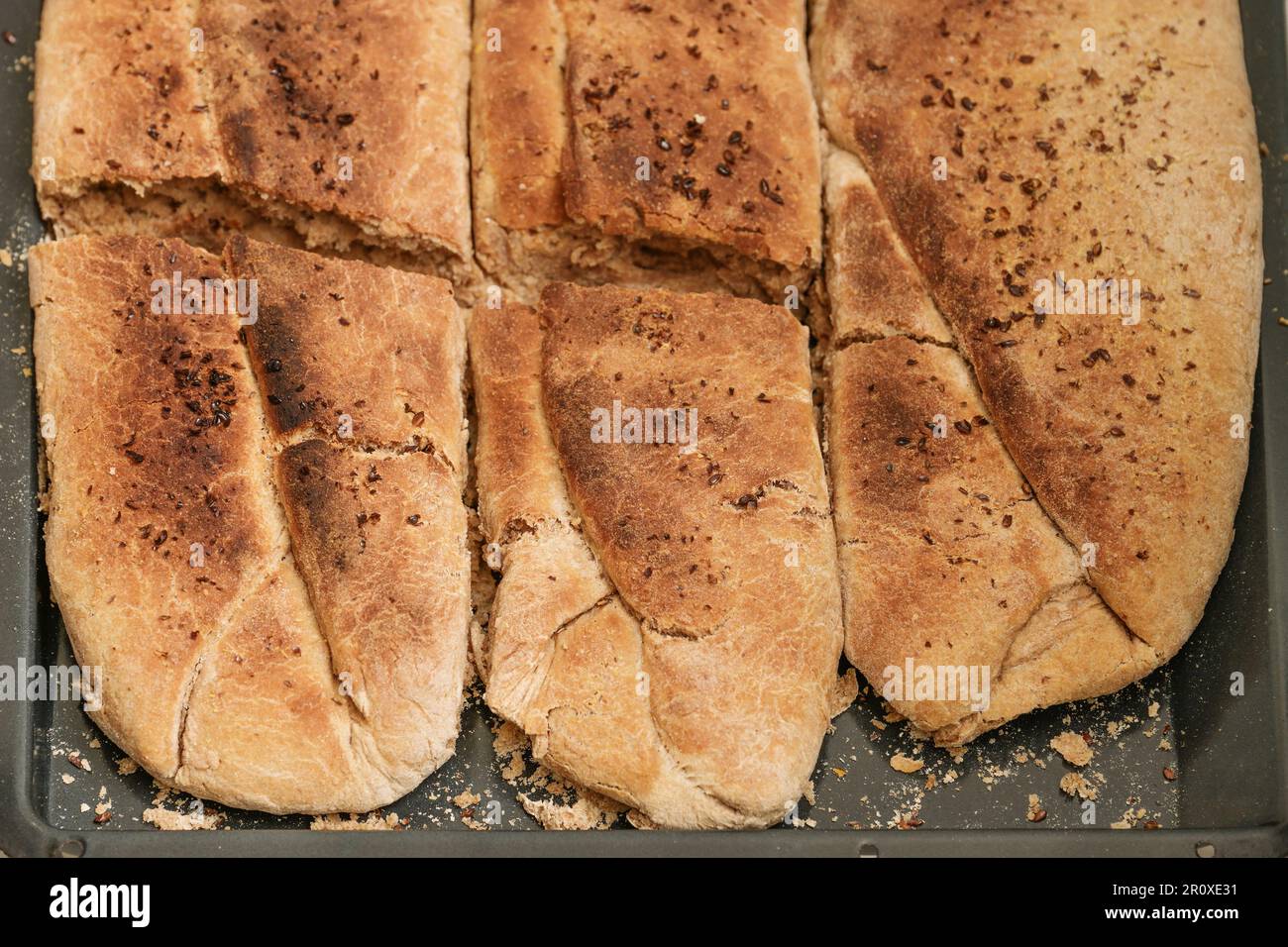 Freshly baked bread from wheat and whole meal flour with yeast on a ...