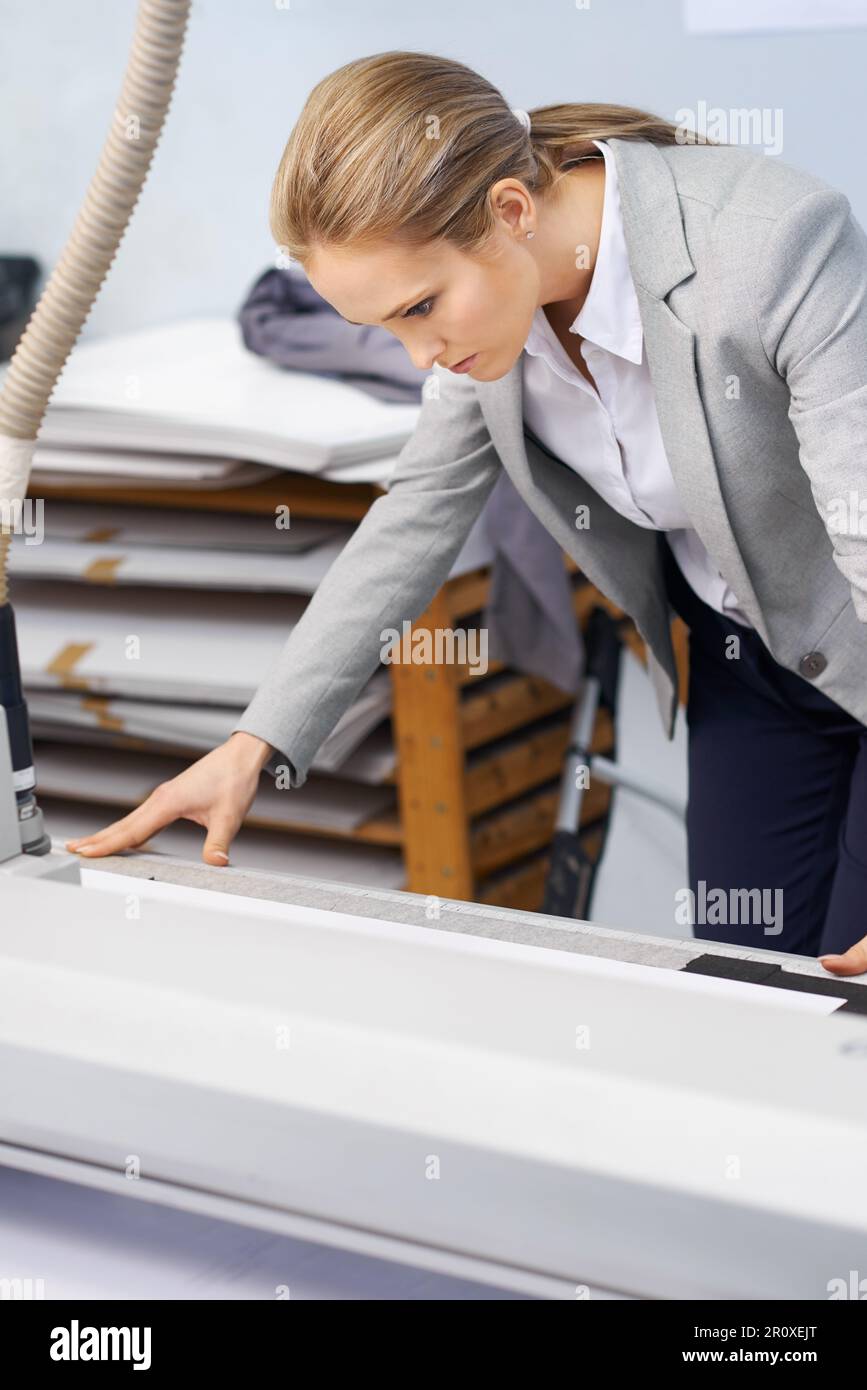 Waiting for the final print. A self-assured young publisher standing ...