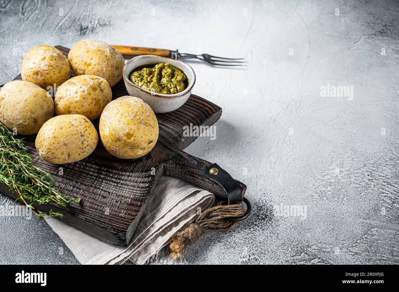 Canary Islands dish Papas Arrugadas, wrinkly potatoes with Mojo verde ...