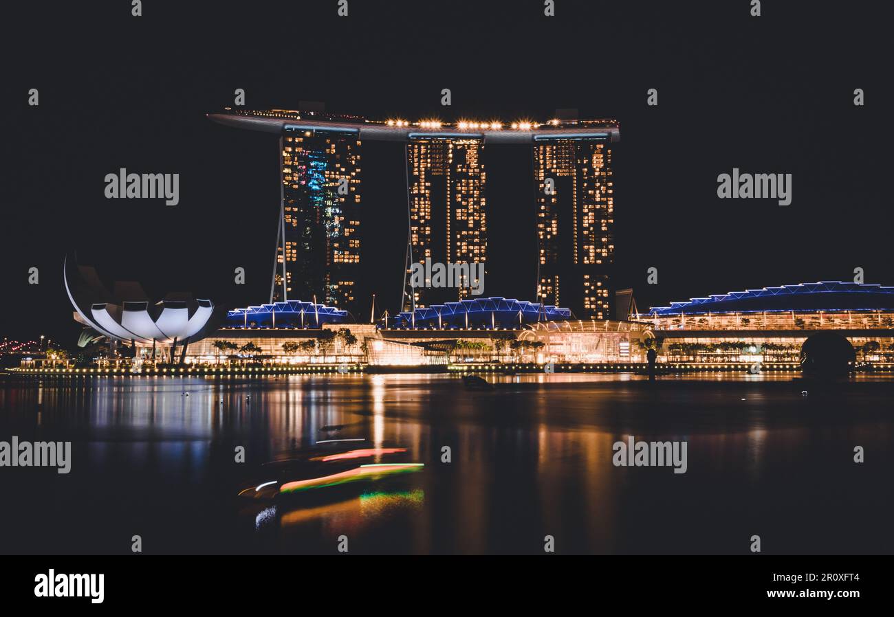 The beautiful nightscape of Marina Bay Sands in Singapore illuminated ...