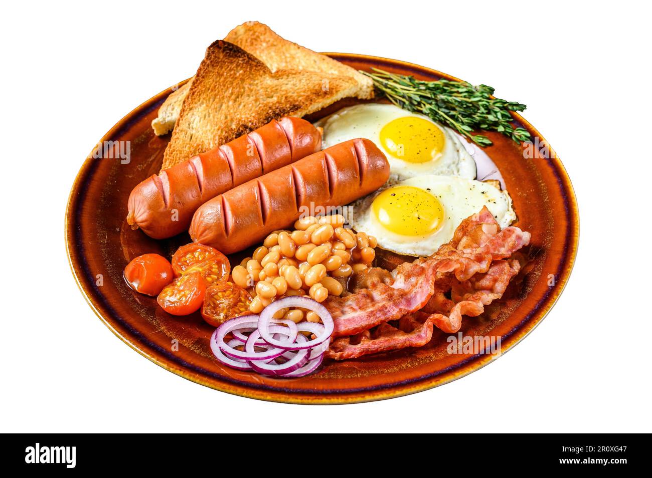 Traditional Full English breakfastt with fried eggs, sausages, bacon ...