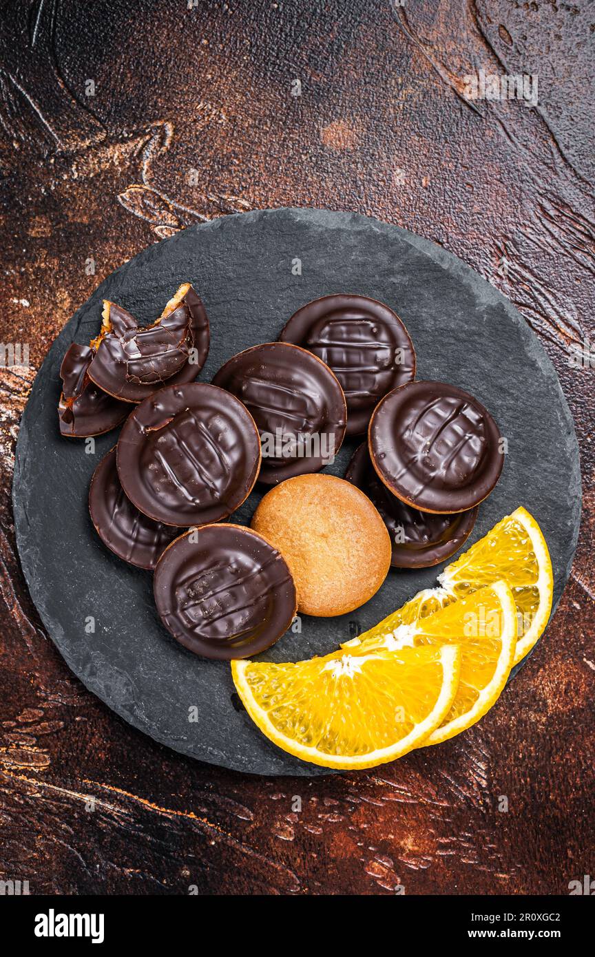 Stack of Chocolate Covered Round Jaffa Cookies with Orange Flavored ...