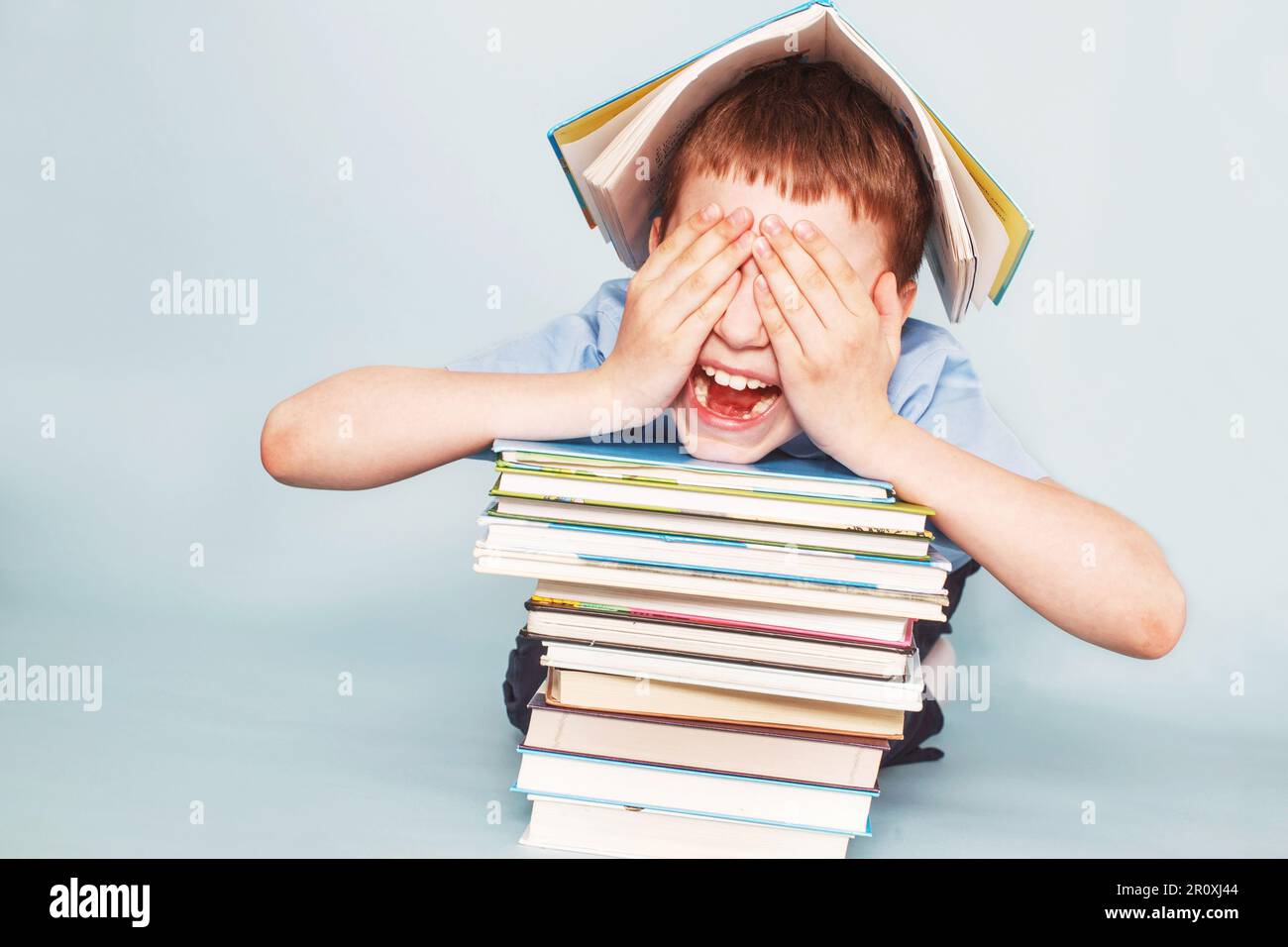 Boy cry classroom book hi-res stock photography and images - Alamy
