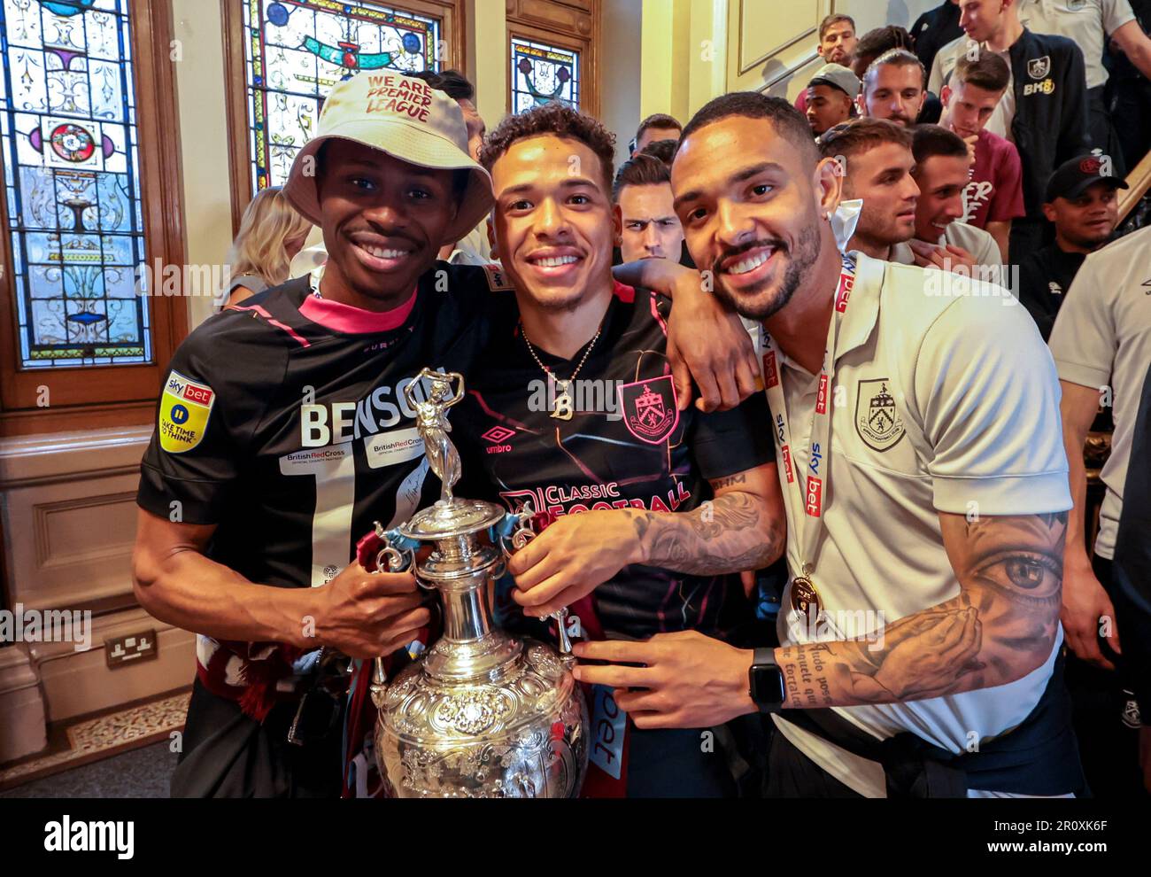 Burnley's Nathan Tella (left), Manuel Benson and Vitinho pose for a ...