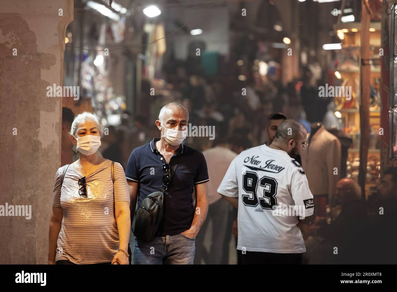 Picture of a group of people wearing a respiratory face mask in the ...