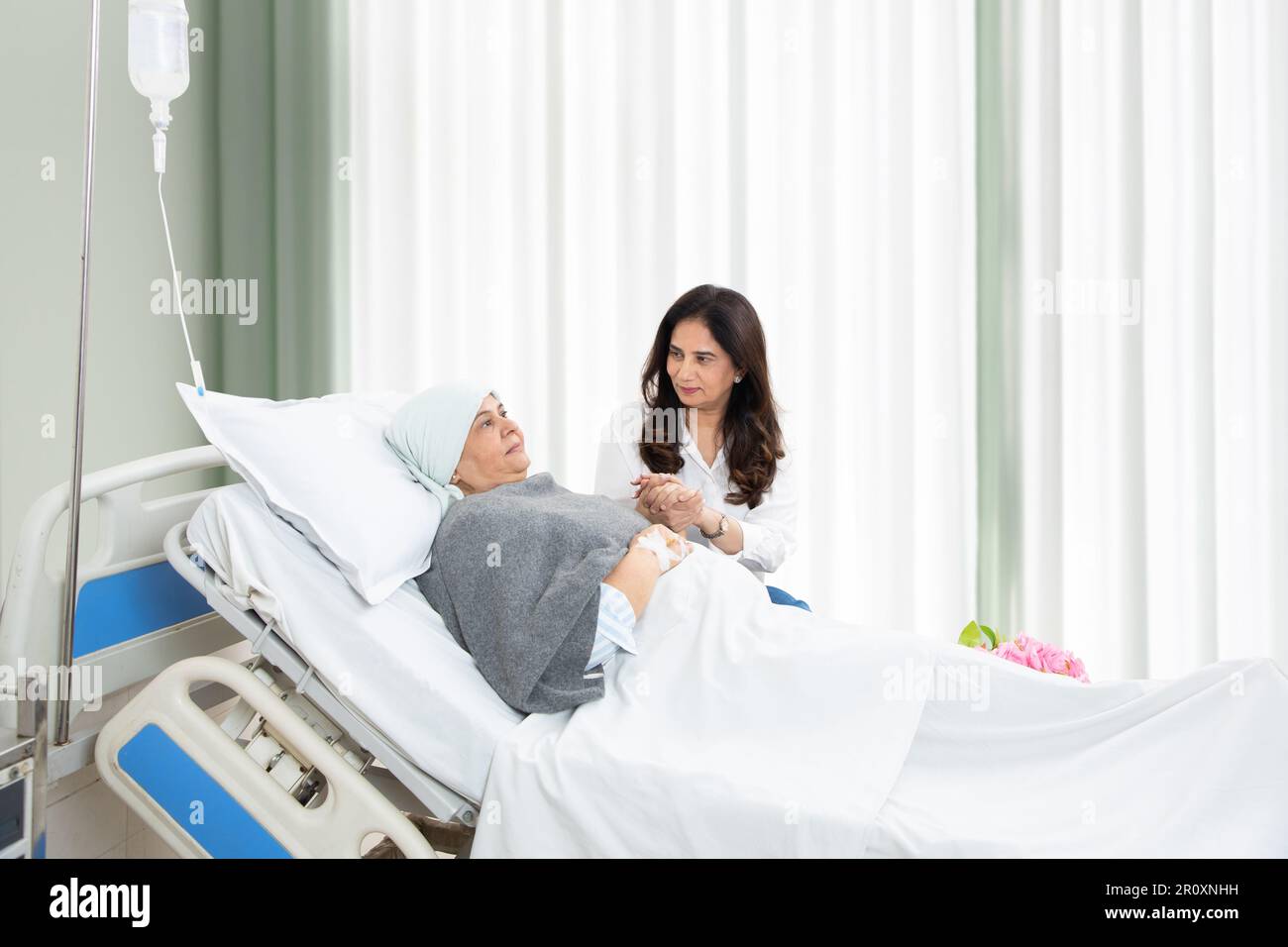 Indian daughter visit her elderly mother cancer patient undergoing ...