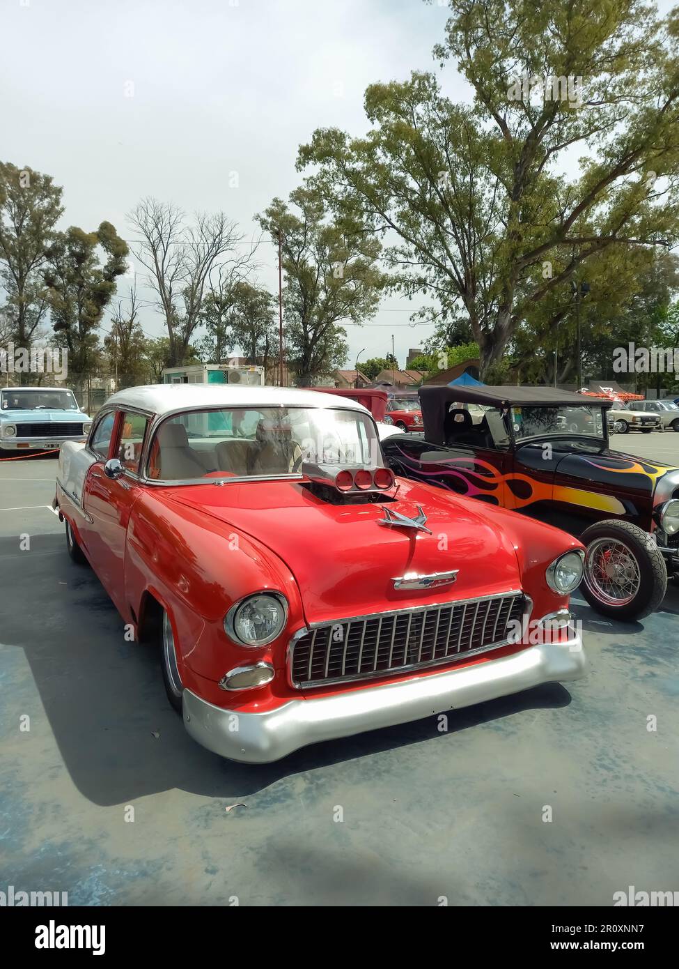 Old red and white 1955 Chevrolet Chevy Bel Air custom lowrider in a ...