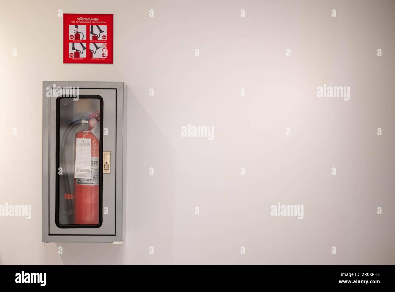 Fire alarm on the wall in the subway in Bangkok, At the Bangkok subway ...