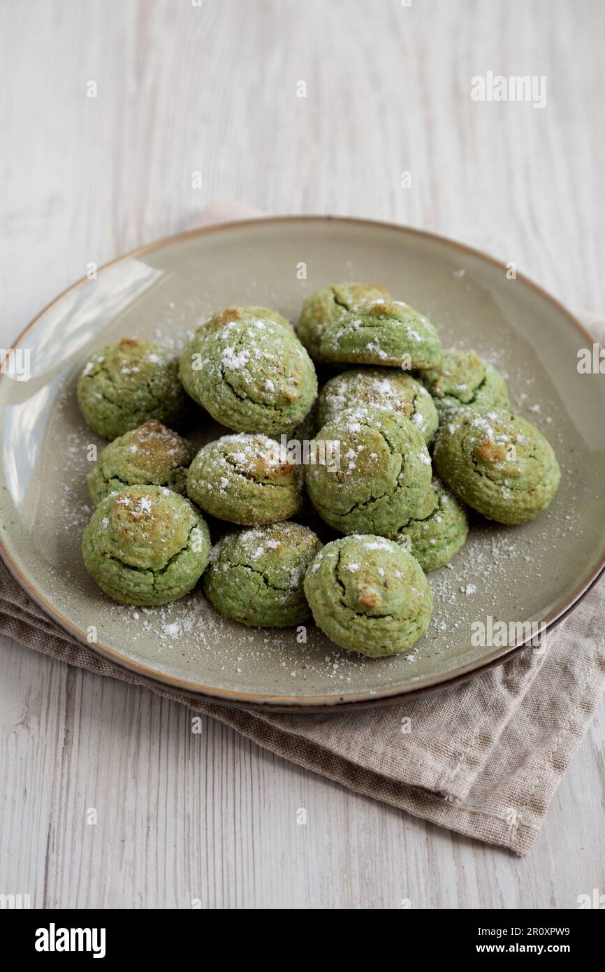 Homemade Soft Amaretti Cookies with Pistachio on a Plate, side view ...