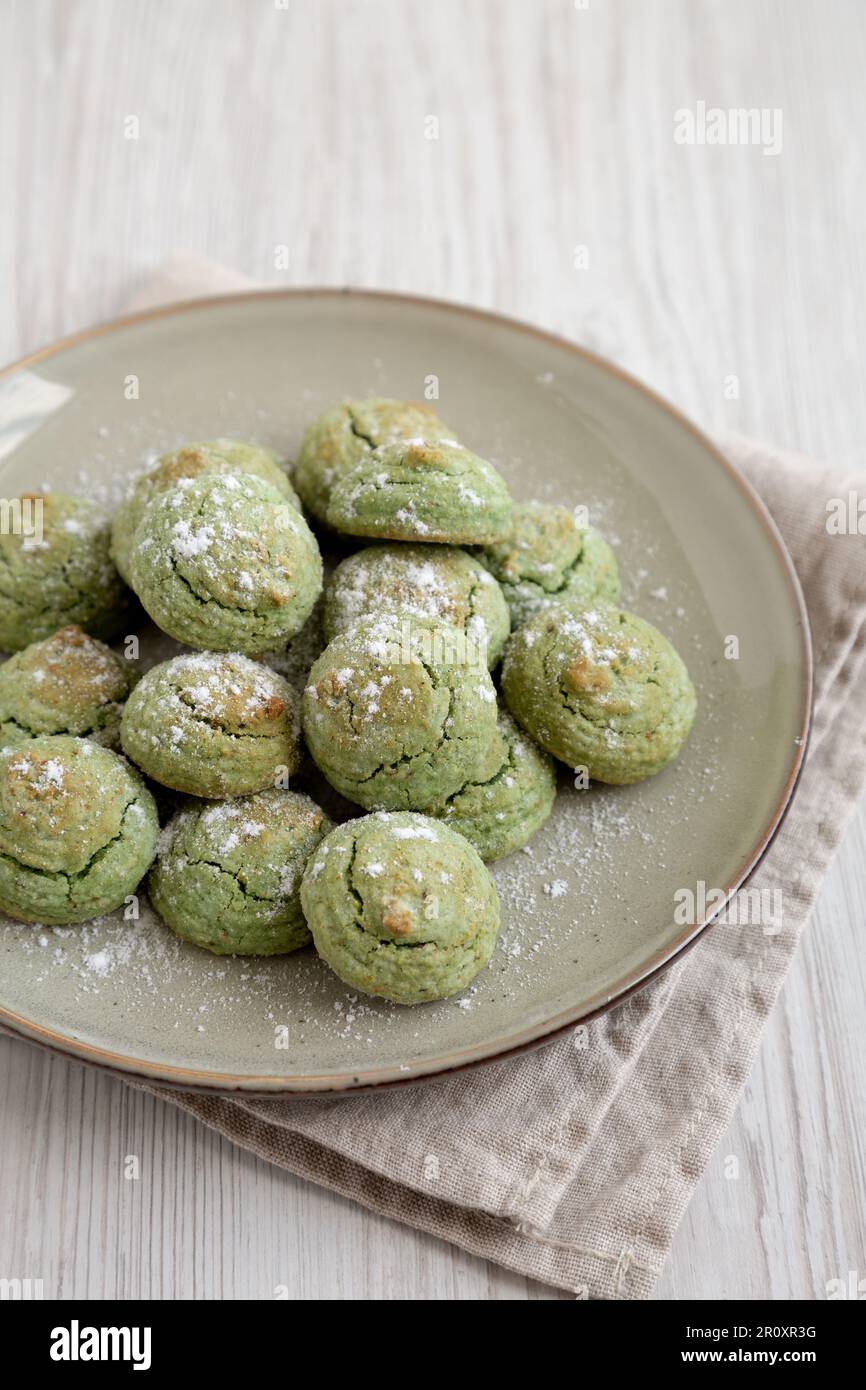 Homemade Soft Amaretti Cookies with Pistachio on a Plate, side view ...