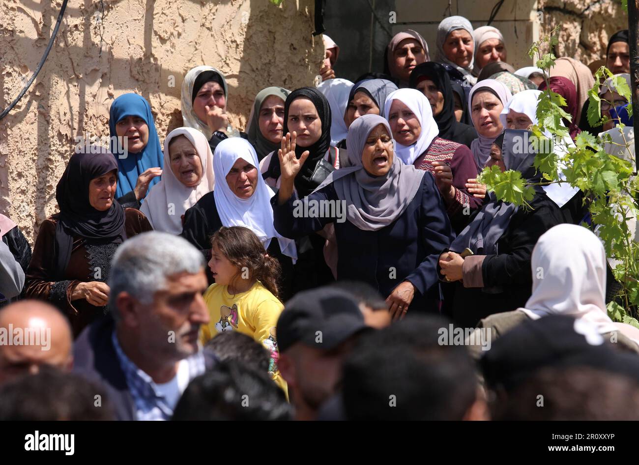 Jenin. 10th May, 2023. Relatives mourn during the funeral of two ...