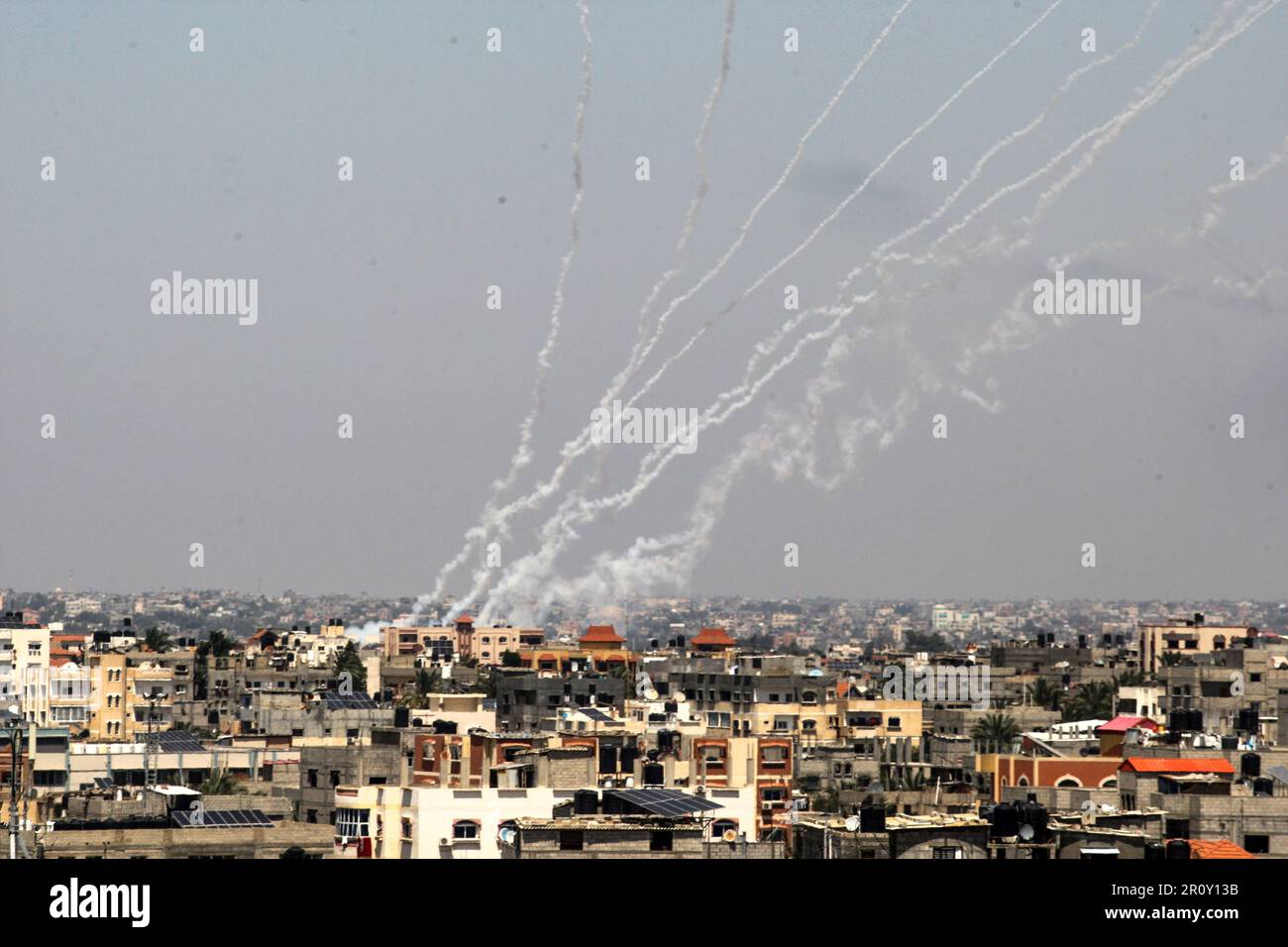 This picture taken from Gaza City shows Palestinian rockets being fired ...