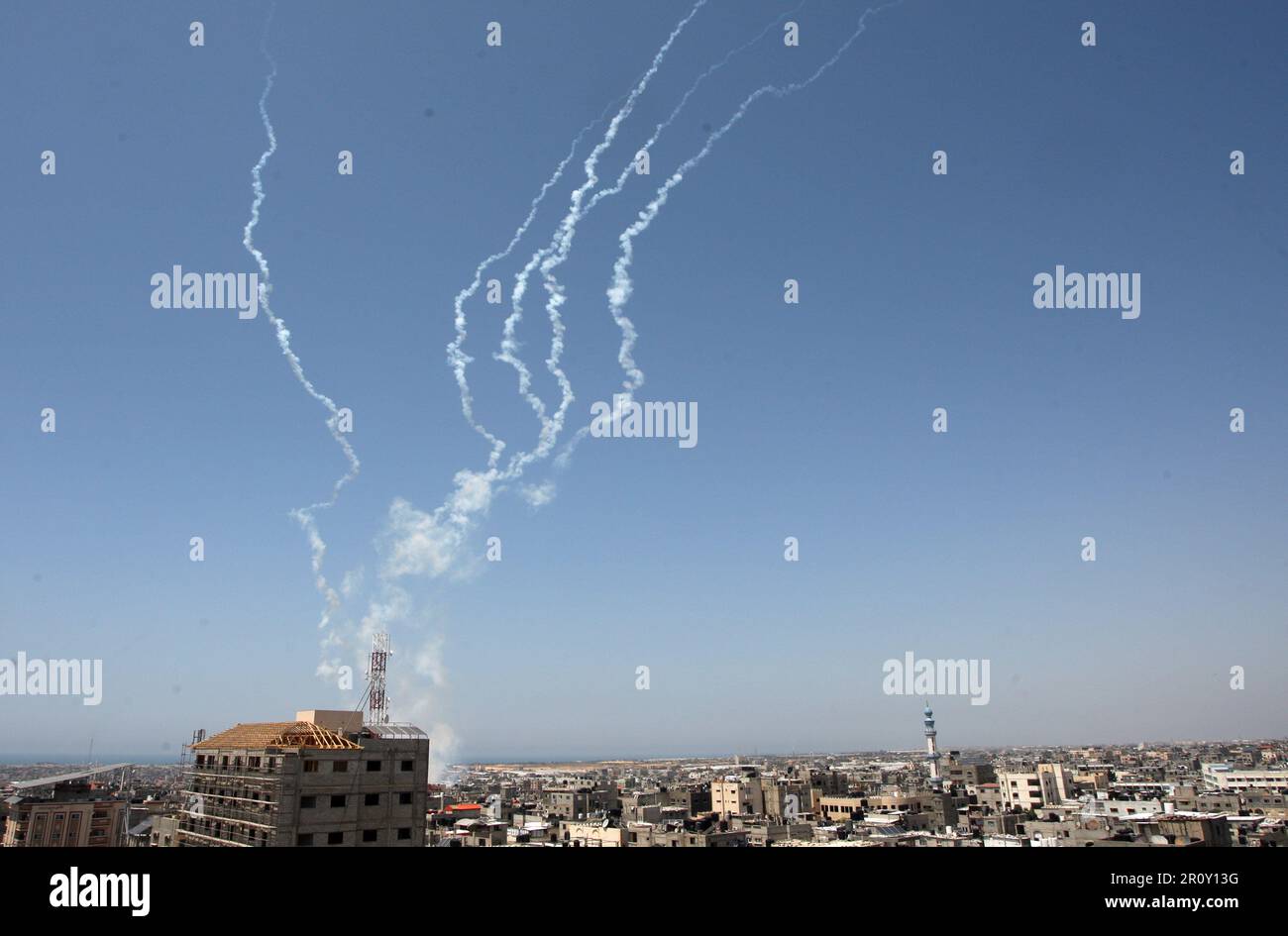 This picture taken from Gaza City shows Palestinian rockets being fired ...