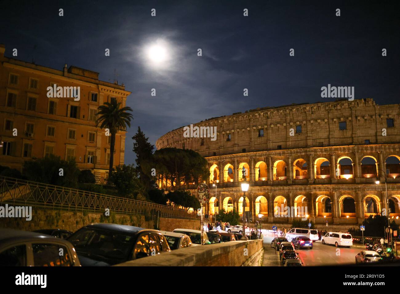 The iconic Coliseum of Rome, Italy illuminated by the lights at night ...