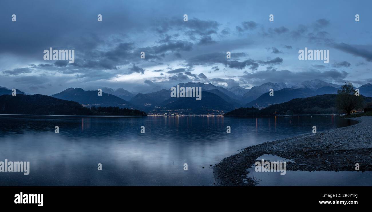 Lake Como just as it starts to rain in the evening blue hour light ...