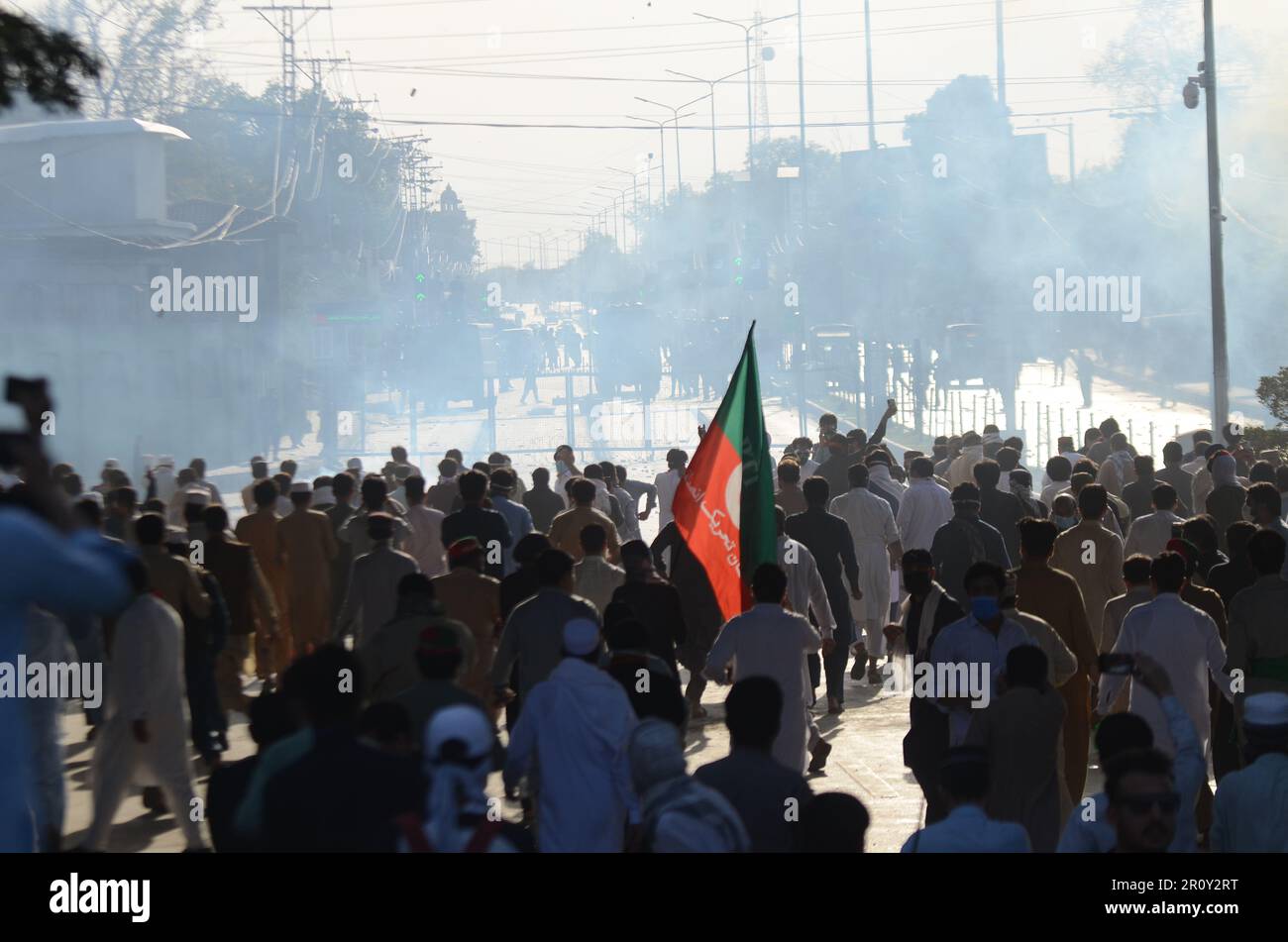 Peshawar, Pakistan. 09th May, 2023. Police fire tear gas to disperse ...