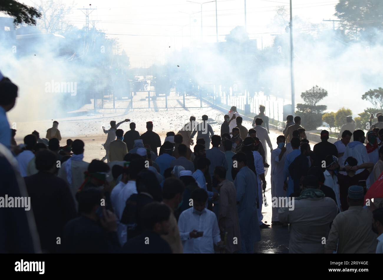 Peshawar, Khyber Pakhtunkhwa, Pakistan. 9th May, 2023. Police fire tear ...