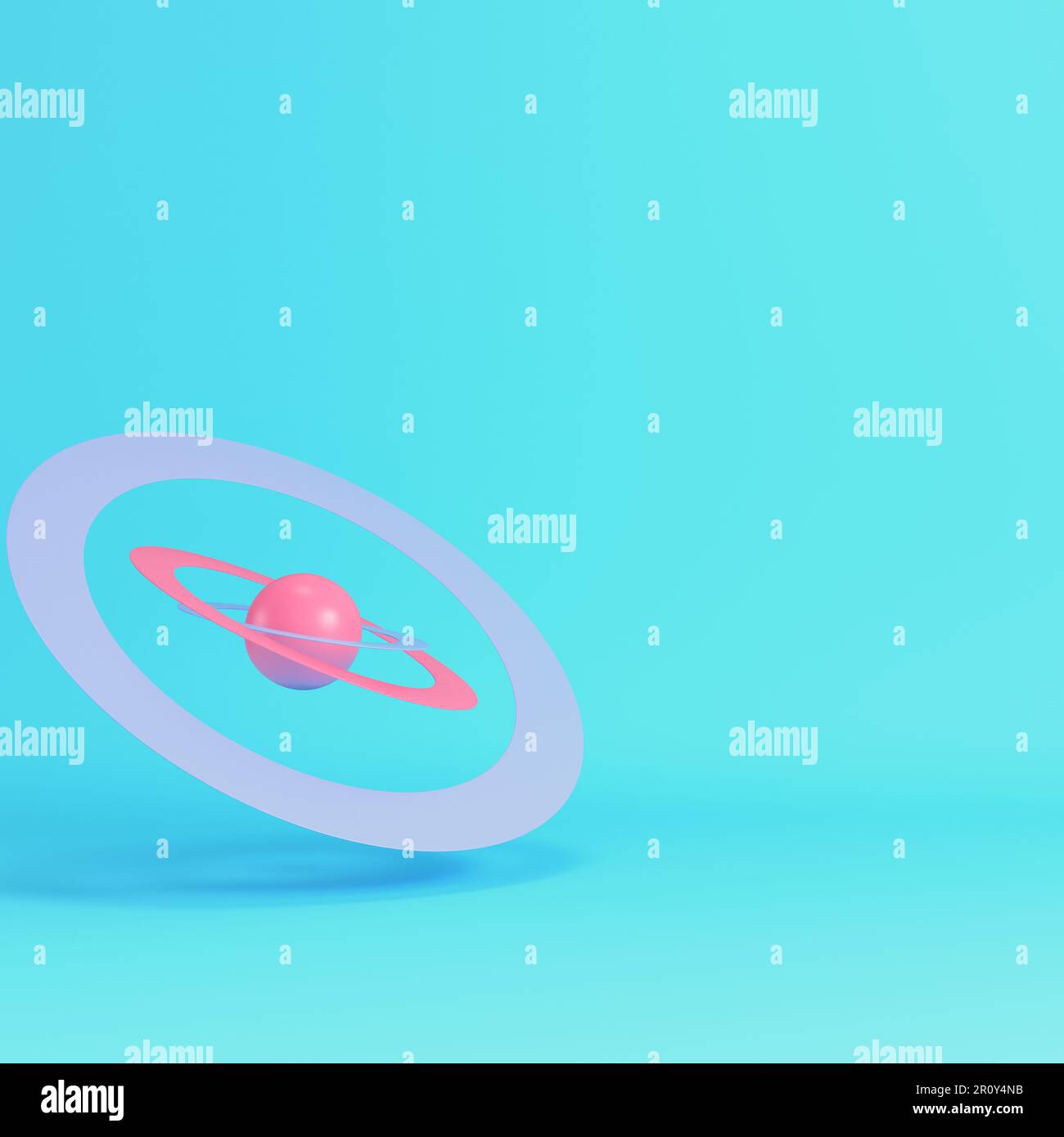 Pink cartoon style planet with rings on bright blue background in ...