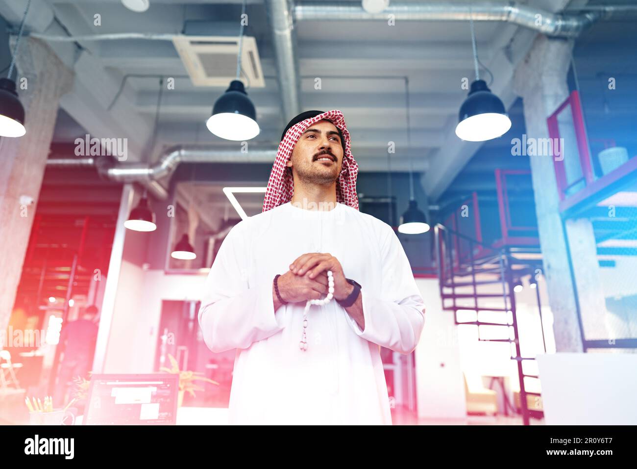 Successful muslim businessmen in traditional outfit in his office Stock ...