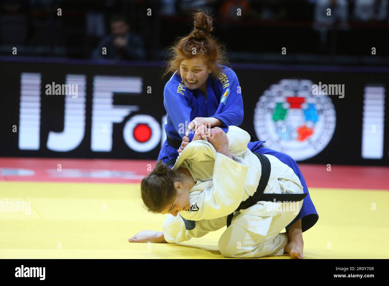 Szofi Ozbas of Hungary, in white, and Lubjana Piovesana of Austria ...