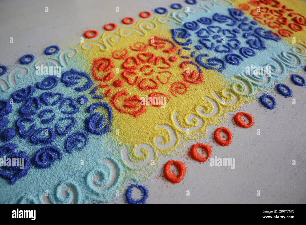 Beautiful multicolored Rangoli design. Border rangolis handmade sand ...