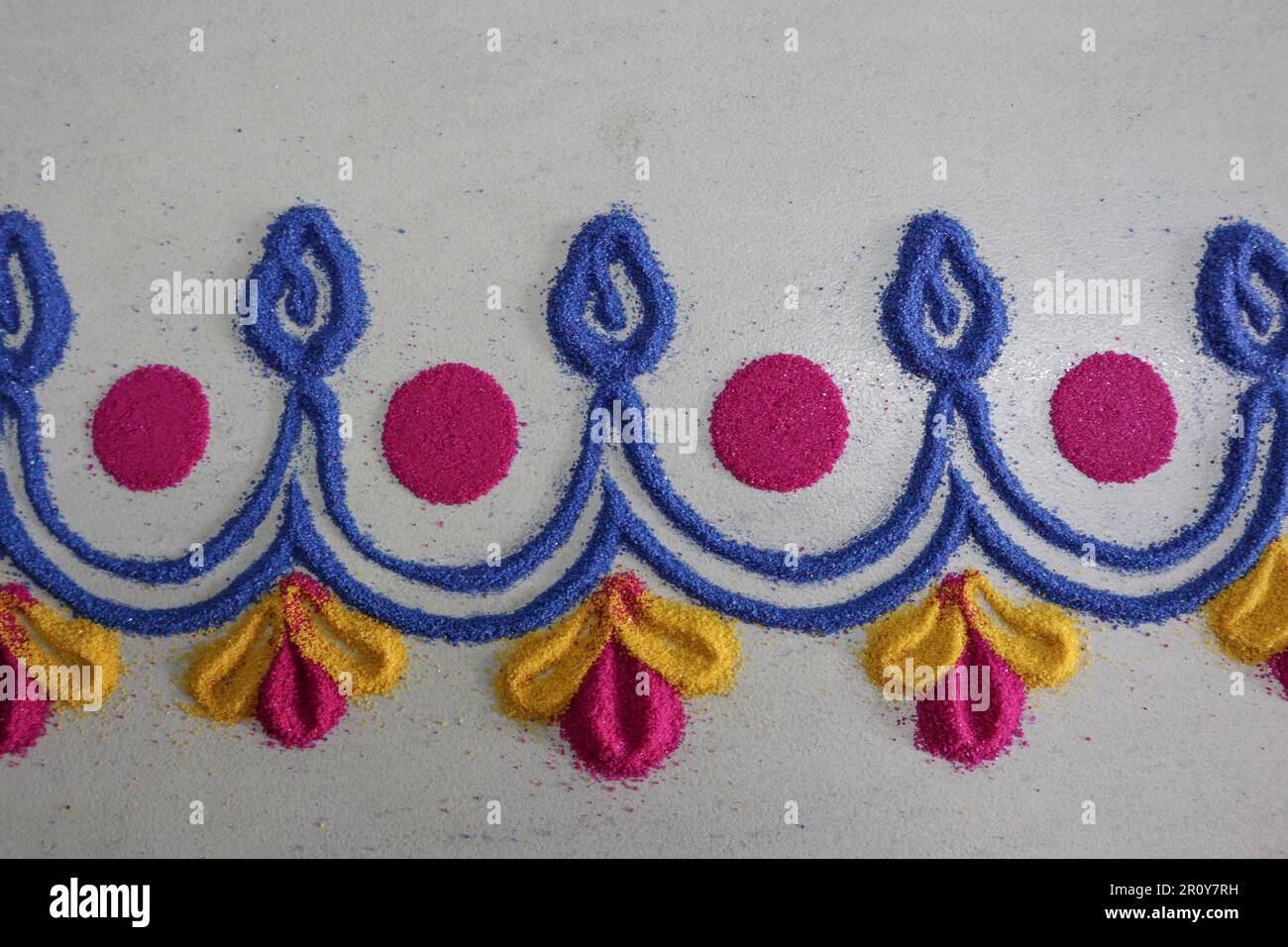 Beautiful multicolored Rangoli design. Border rangolis handmade sand ...
