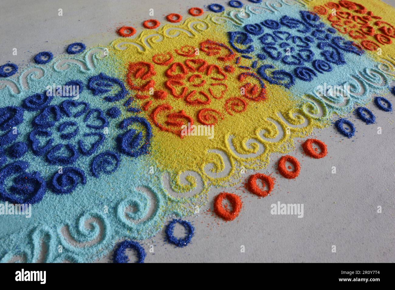 Beautiful multicolored Rangoli design. Border rangolis handmade sand ...