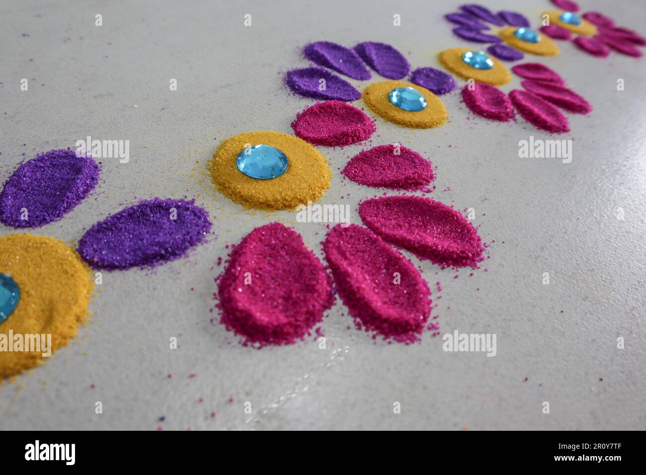 Beautiful multicolored Rangoli design. Border rangolis handmade sand ...