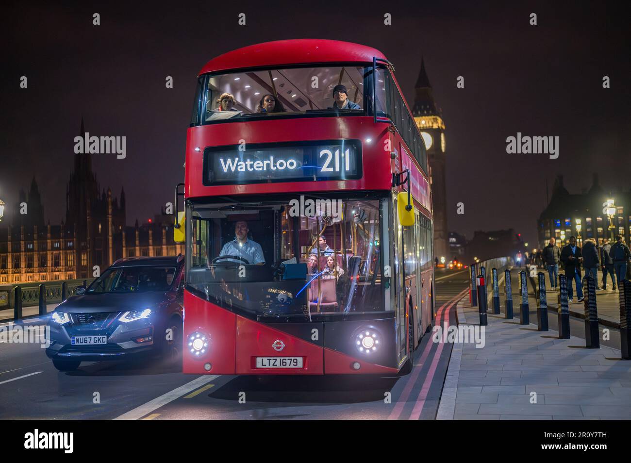 LONDON - April 21, 2023: Red bus en route to Waterloo crosses ...