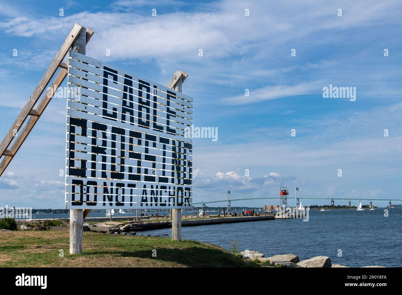 Close up view of a large sign on the shore of Fort Adams State Park ...
