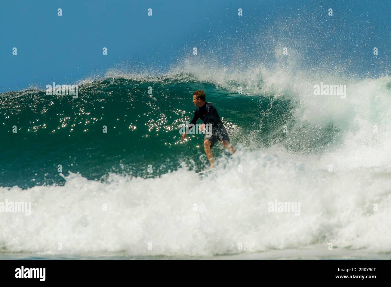 Shortboard surfer rides an overhead wave at this fast-growing surf ...