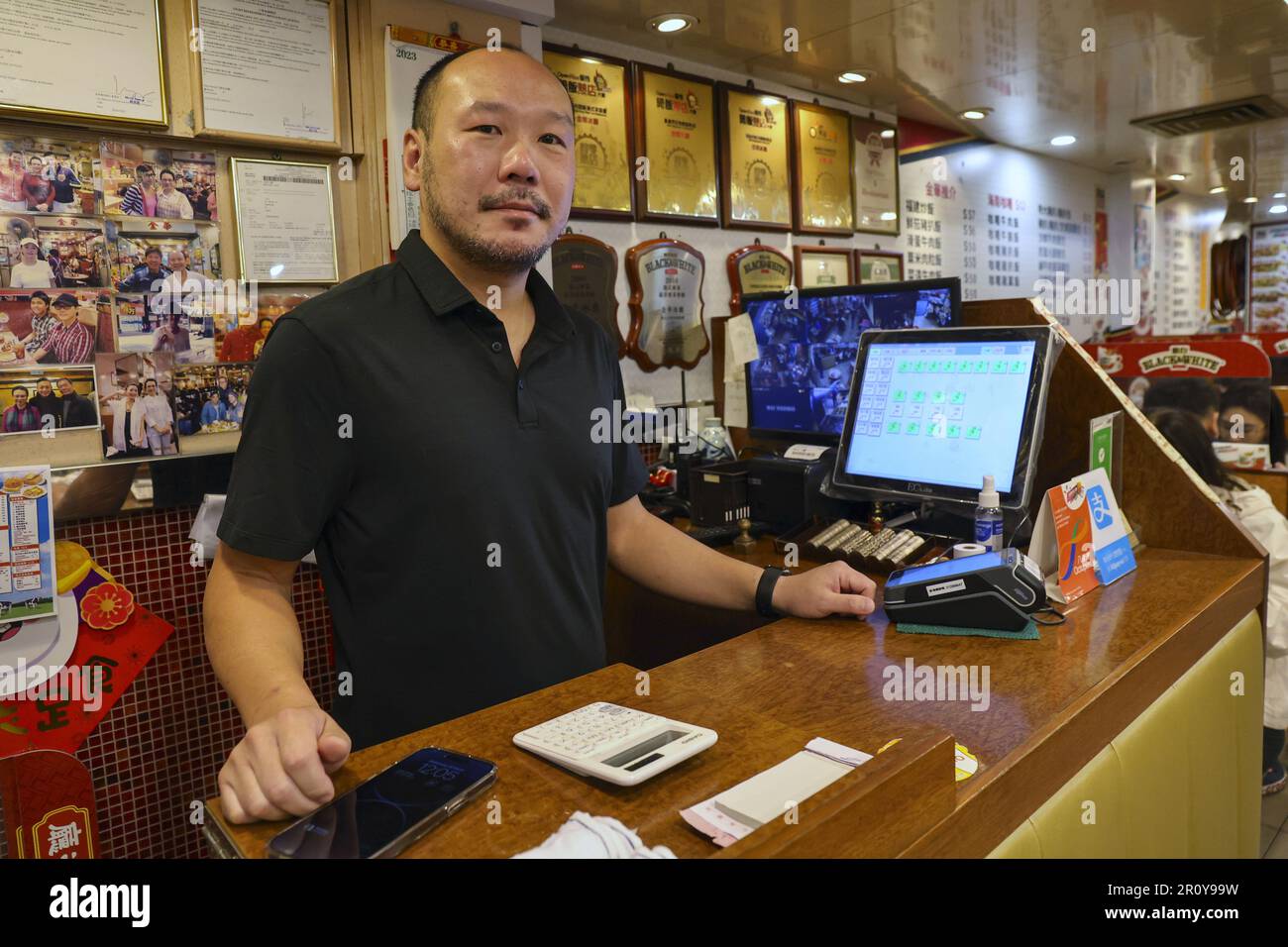 Donald Chan, cafe manager of Kam Wah Cafe, poses for a picture at Kam ...