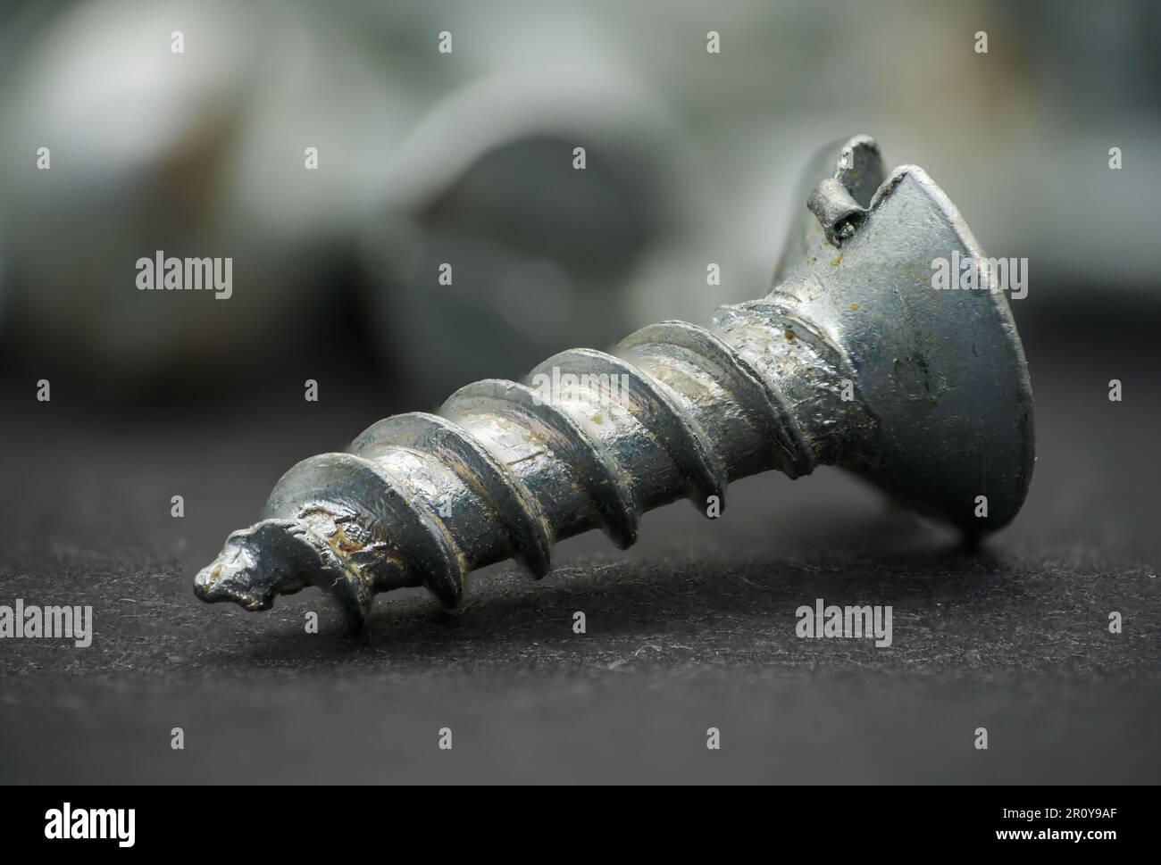 Small screw in macro close up, shallow DOF Stock Photo - Alamy