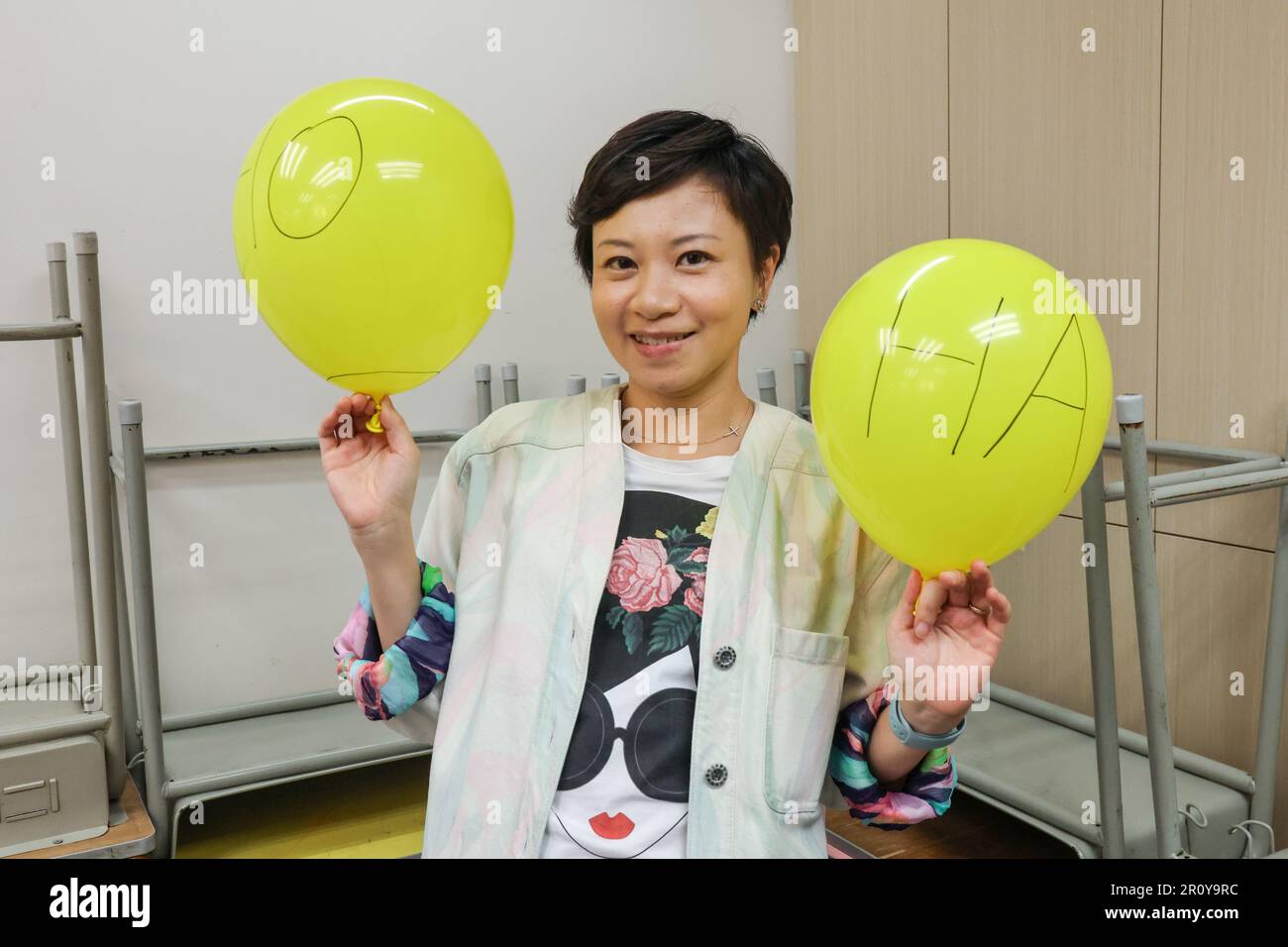 Vincy Chau,Laughter Yoga instructor, encouraging students to laugh in ...