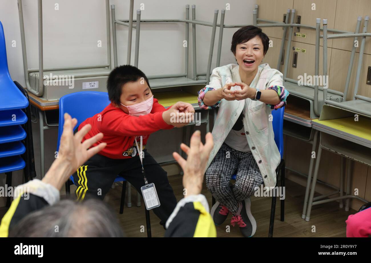 Vincy Chau,Laughter Yoga instructor, encouraging students to laugh in ...