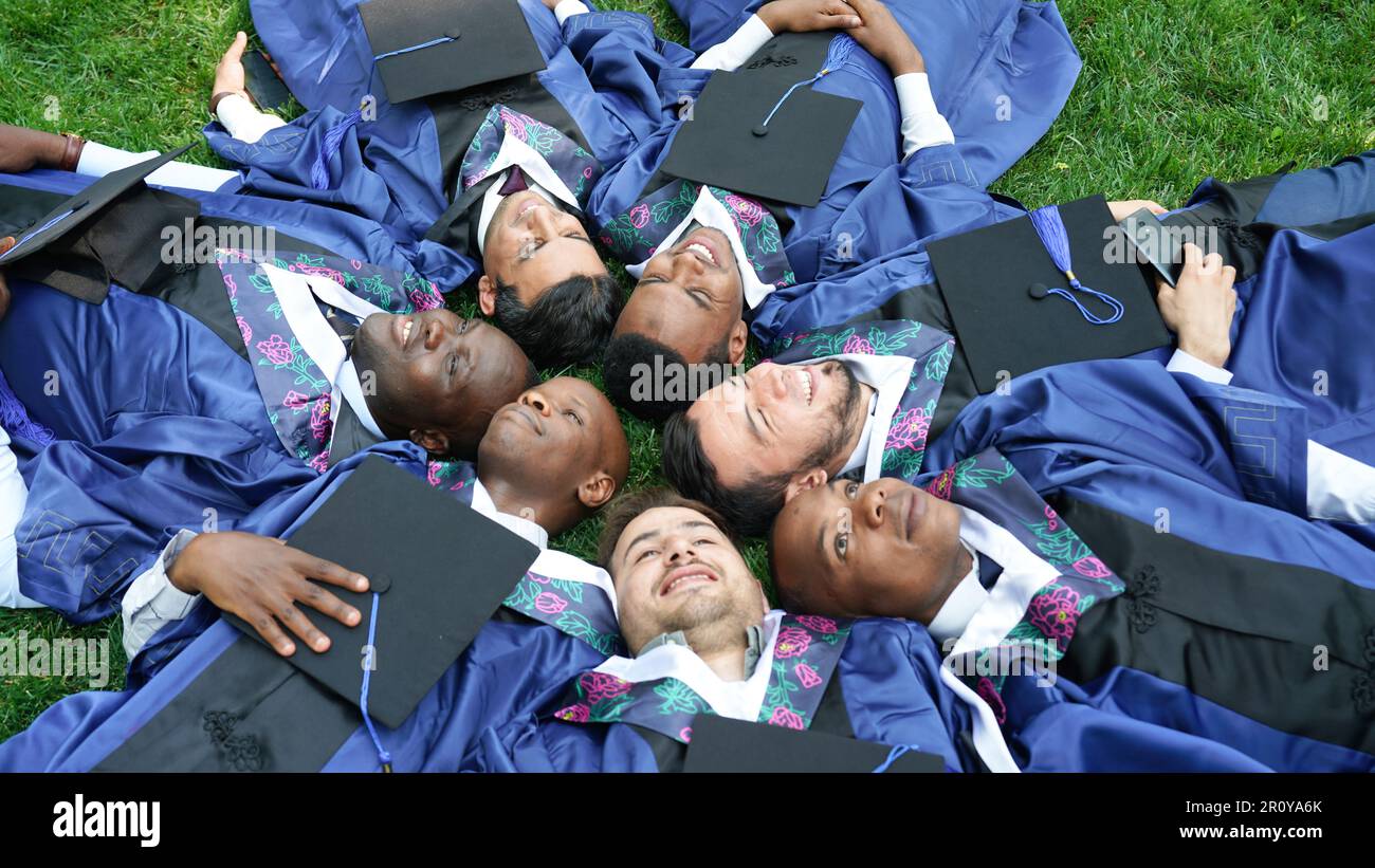 A great photo of interracial students from diverse countries smiling to ...