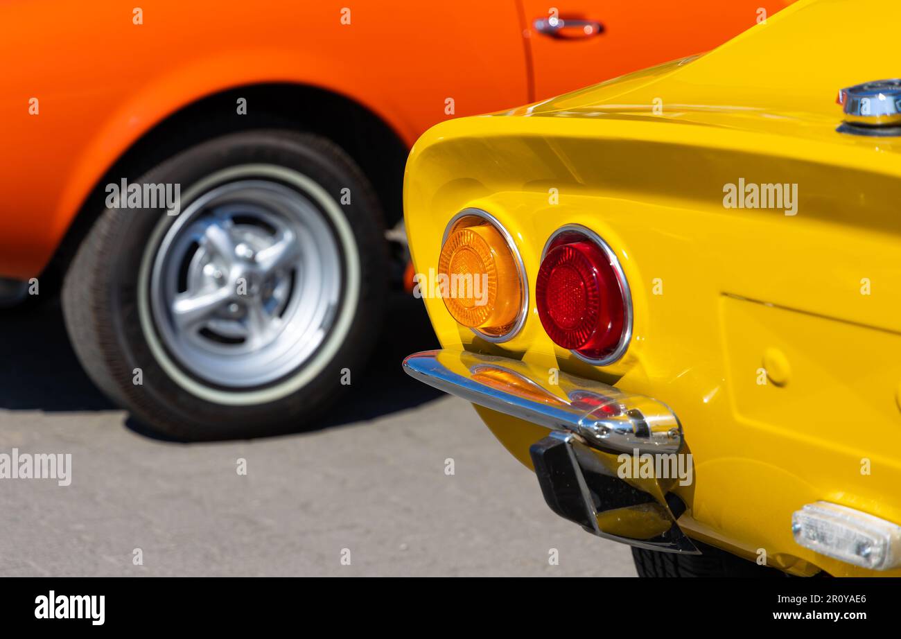 Close-up of the tale lights of yellow sport classic car. Beautifully ...