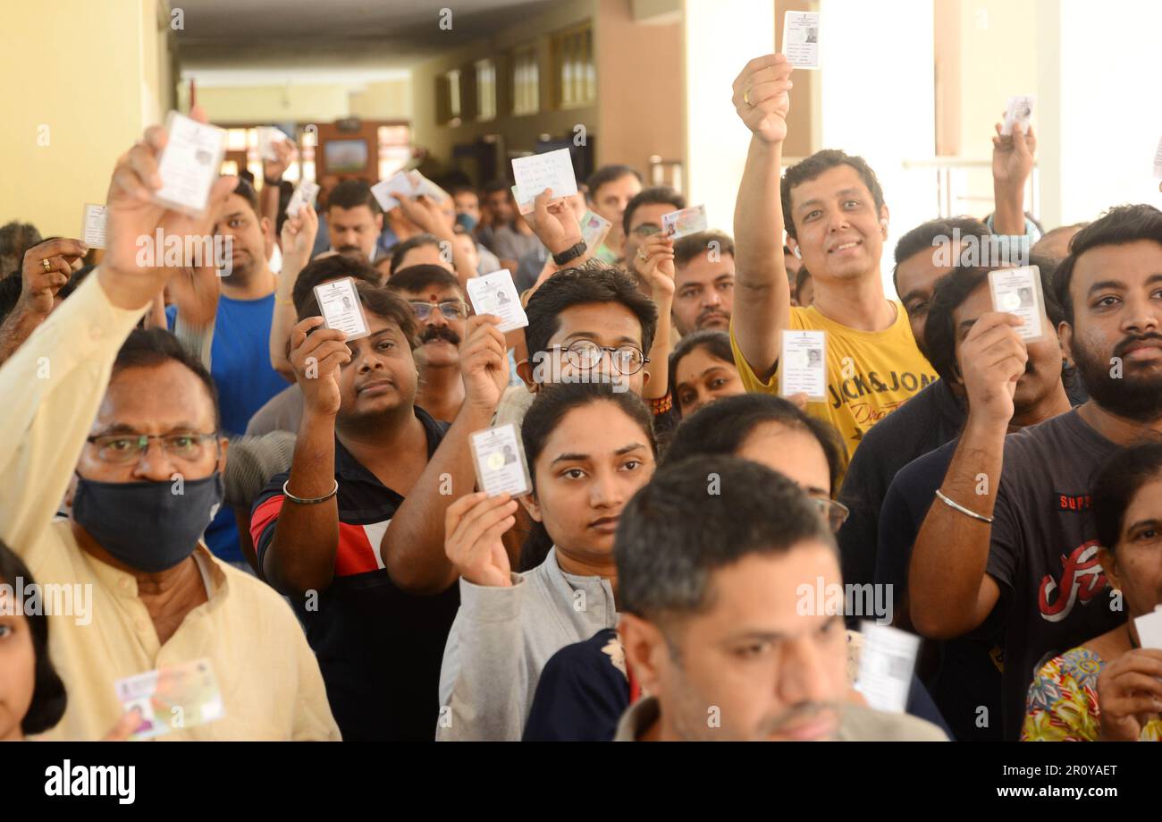 Bengaluru, India. 10th May, 2023. Voters wait outside a polling booth ...