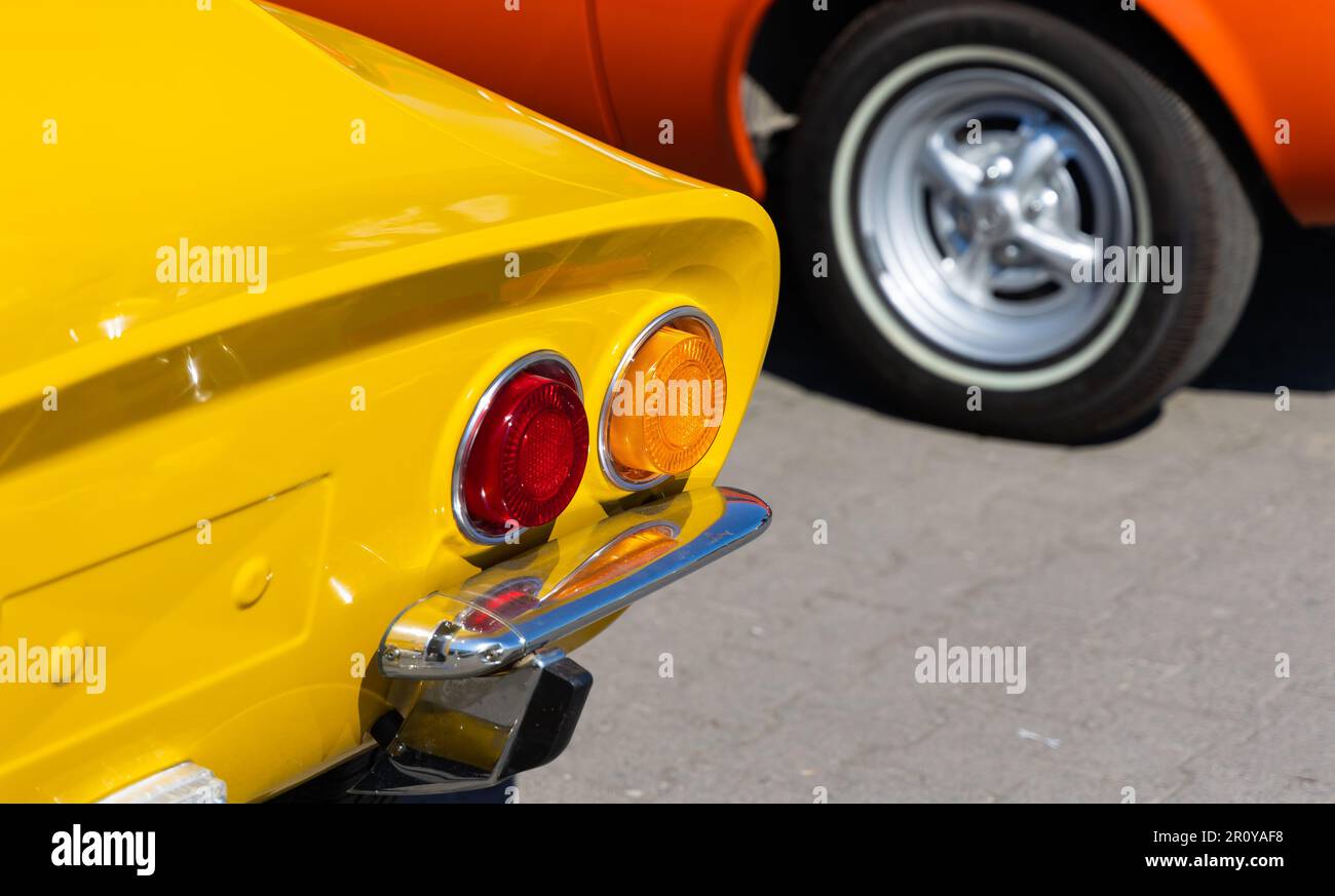 Close-up of the tale lights of yellow sport classic car. Beautifully ...
