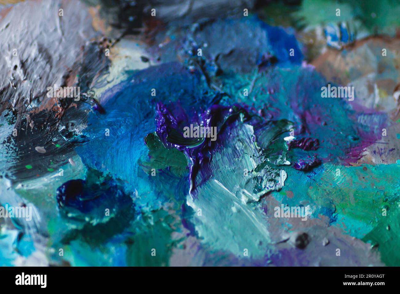 Detail of mixed colours in an paint palette Stock Photo - Alamy