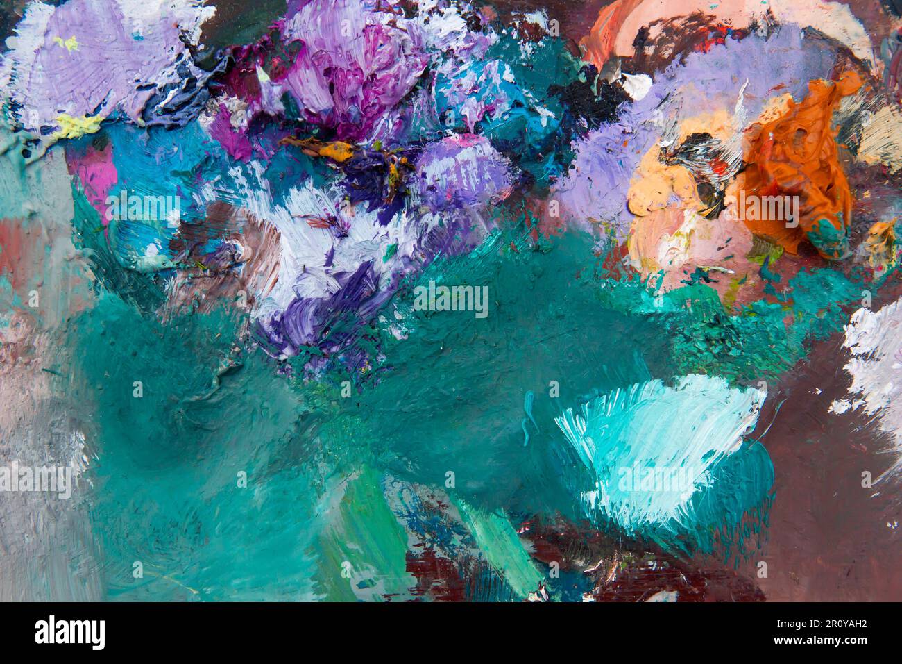 Detail of mixed colours in an paint palette Stock Photo - Alamy