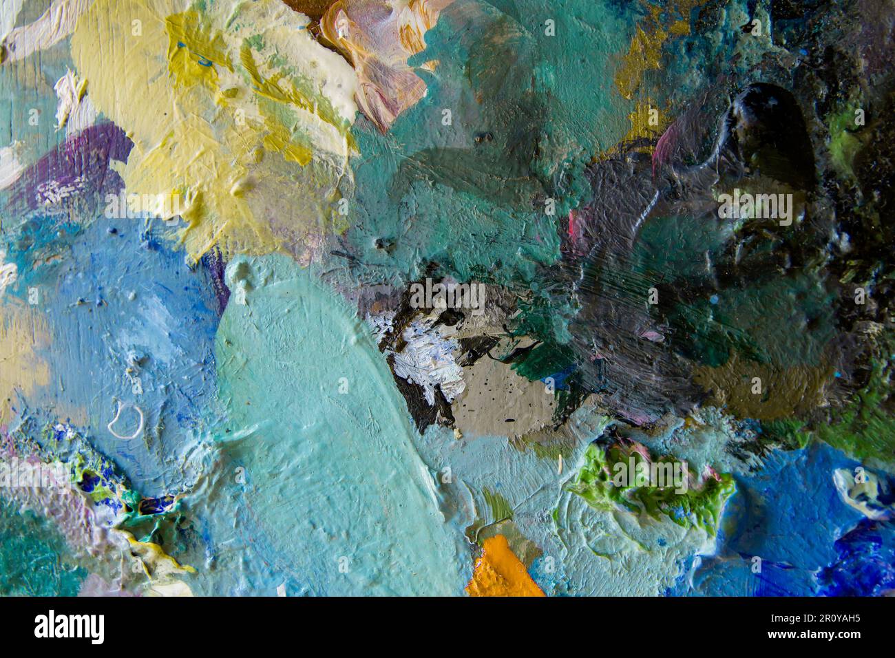 Detail of mixed colours in an paint palette Stock Photo - Alamy