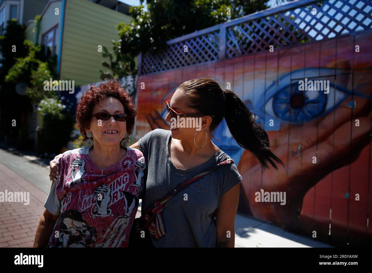 Miranda Bergman (l to r), talks with fellow muralist, Lucia Ippolito on ...
