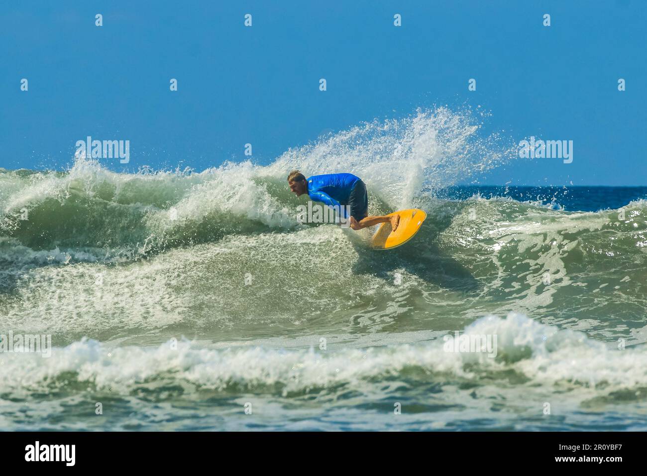 Shortboard surfer does a cutback turn on a wave at this fast-growing ...